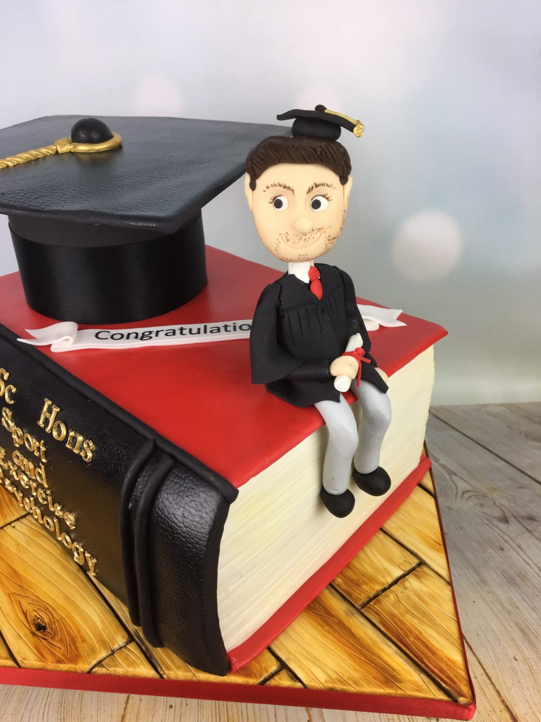 Graduation cake - Book Cake - Mel's Amazing Cakes