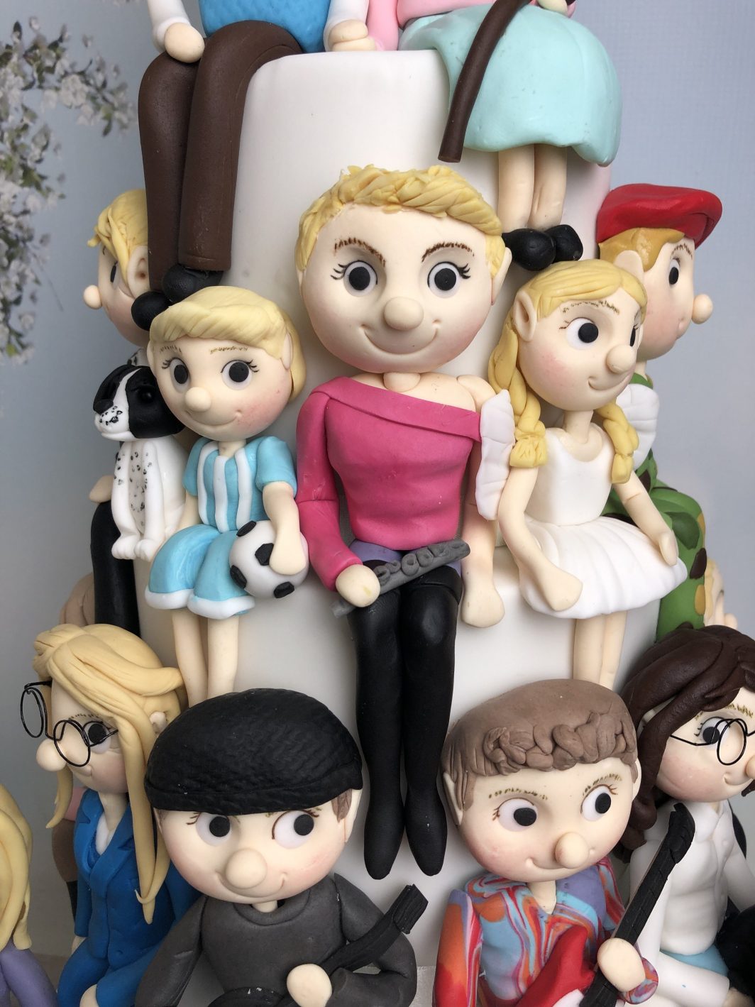 Tiered Cake with Family Member Figures - Mel's Amazing Cakes